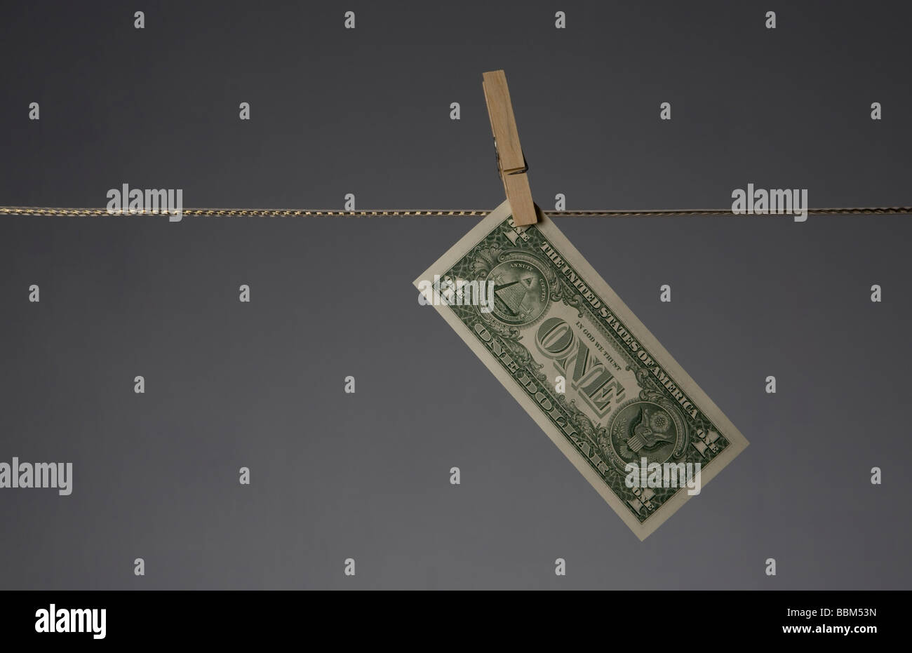 dollar bill on washing line Stock Photo - Alamy