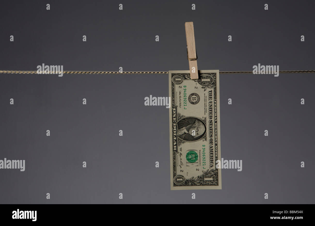 dollar bill on washing line Stock Photo - Alamy