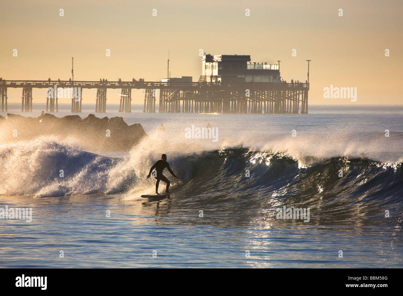 Surfing Newport Beach with the Newport Pier in the background Orange ...