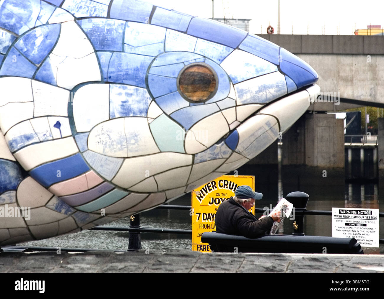 Belfast, Northern Ireland: Fish and man read morning paper on Donegal ...