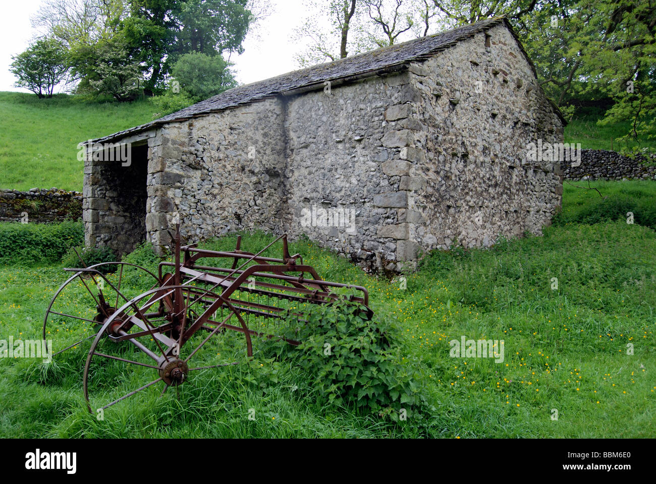 An old barn or farm building beside a footpath near Malham Village in ...