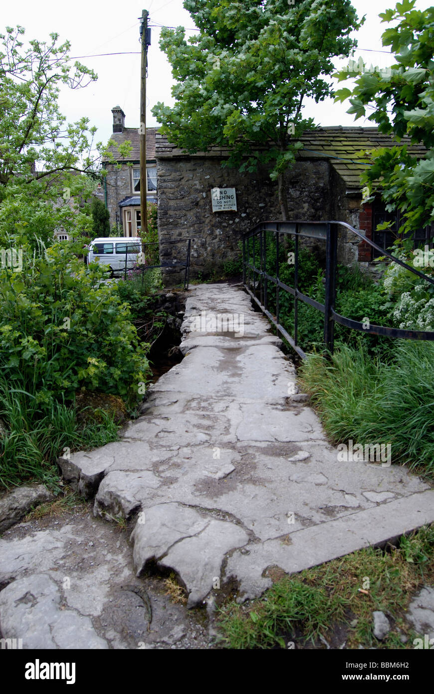 The Stone Clapper Bridge at Malham Village in the Yorkshire Dales Stock ...
