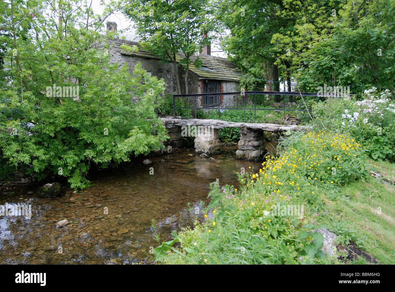 The Stone Clapper Bridge at Malham Village in the Yorkshire Dales Stock ...