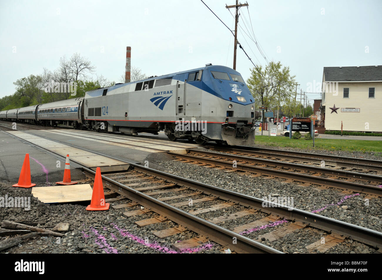 Amtrak train speeding through small town in USA Stock Photo - Alamy