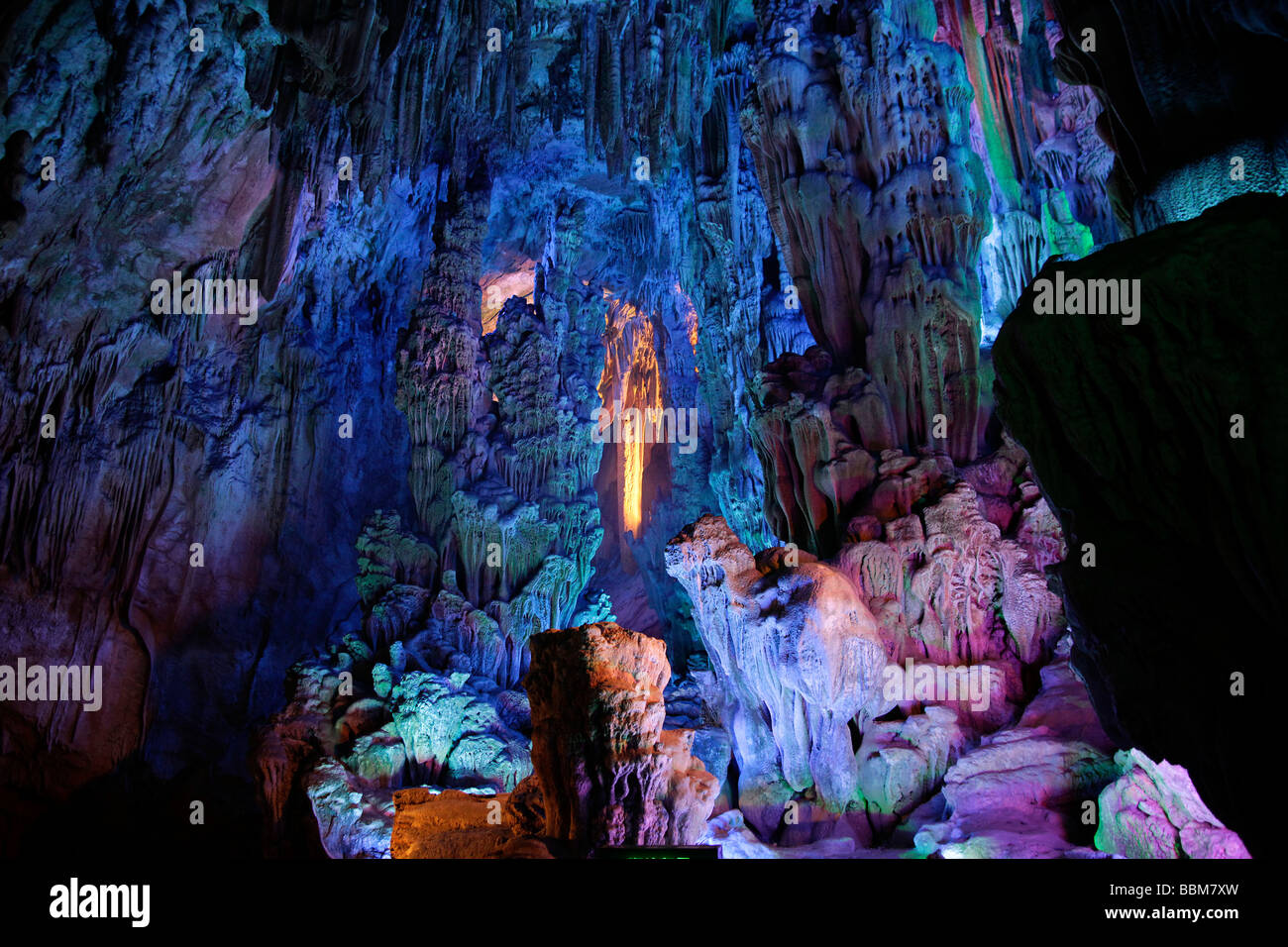Colourful illumination in the largest stalactite cave of Guilin, the ...
