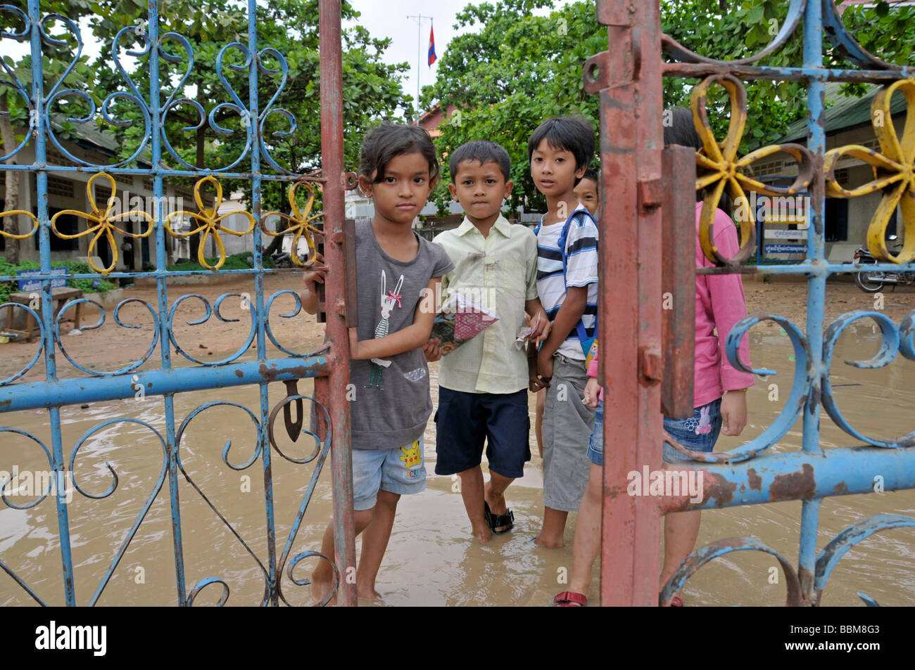 Pupils at the entrance gate to a private language school, Siem Reap ...