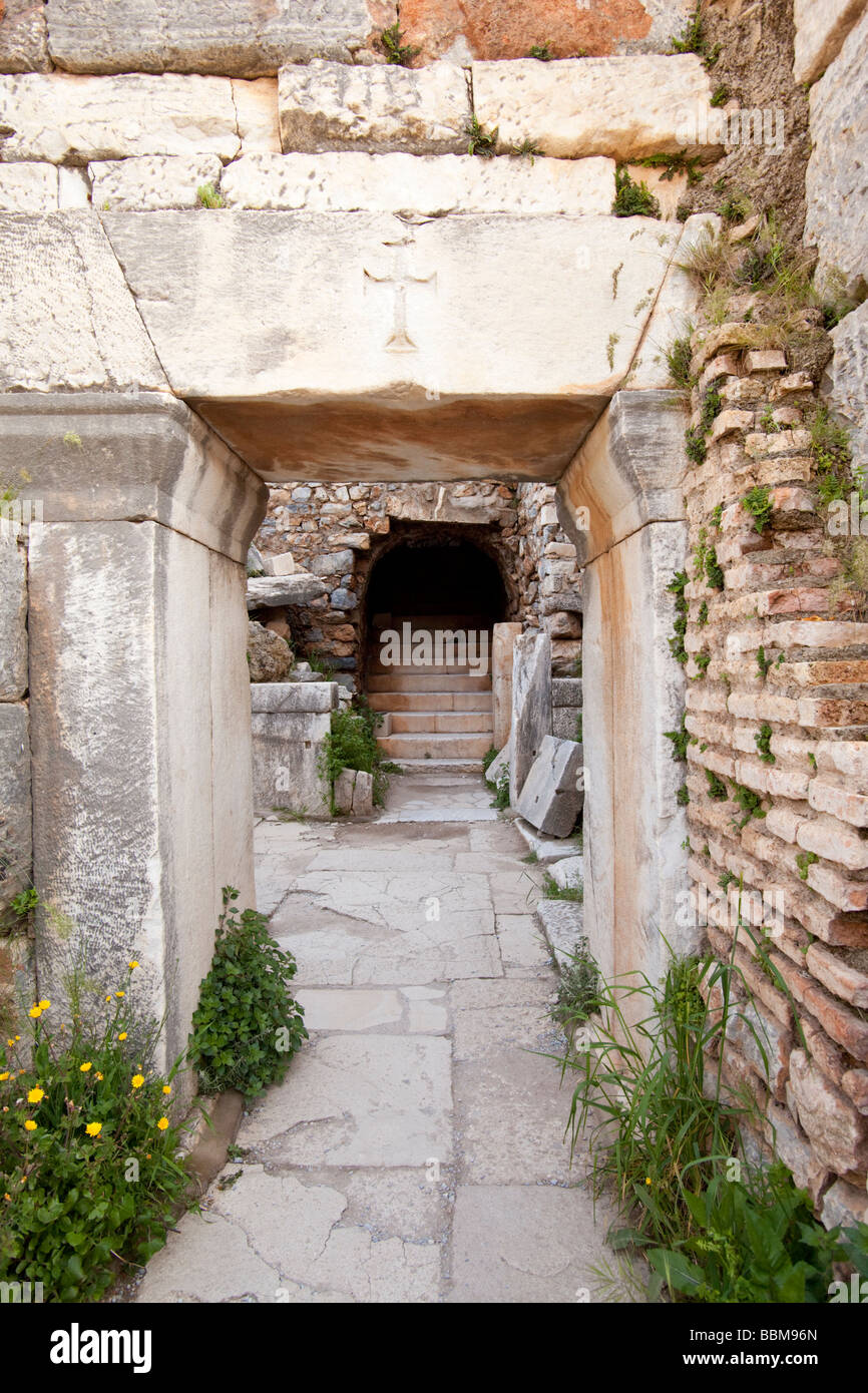Christian cross carved above an entrance into an ancient building in ...