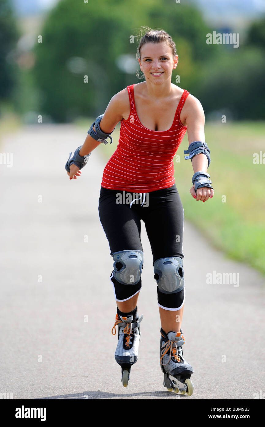 Girl, inline skating Stock Photo - Alamy