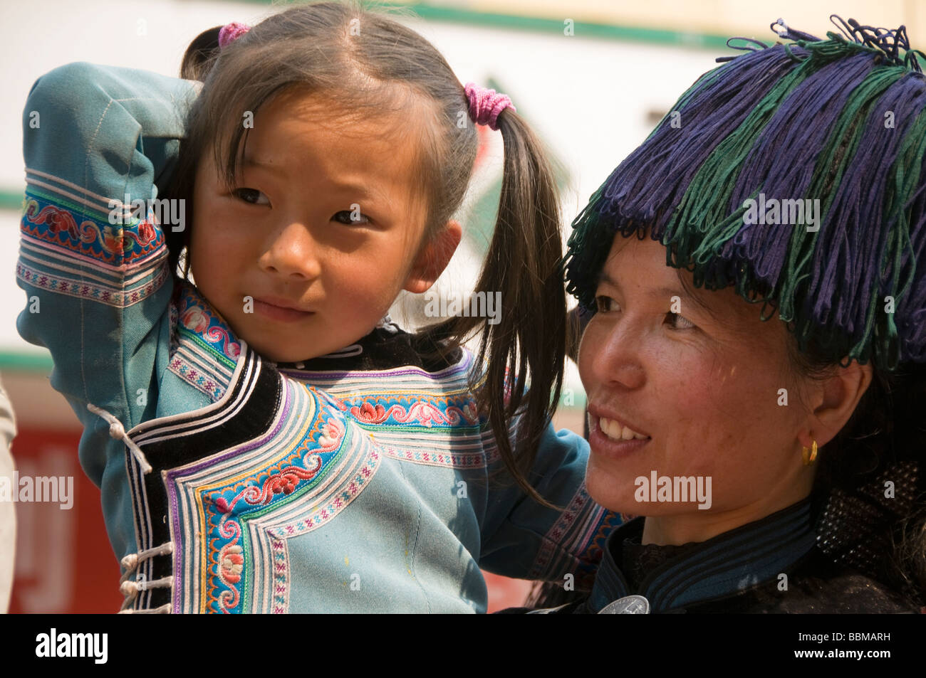 Hani minority girl and her mother in Yuanyang China Stock Photo - Alamy