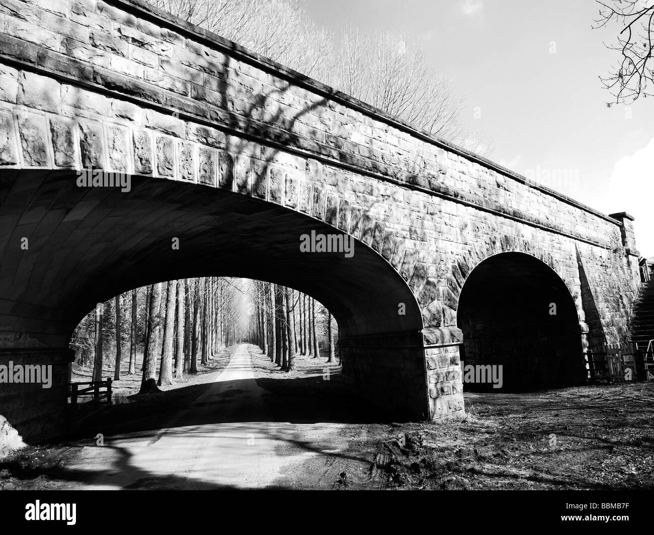 railway bridge over road country lane footpath countryside Stock Photo ...