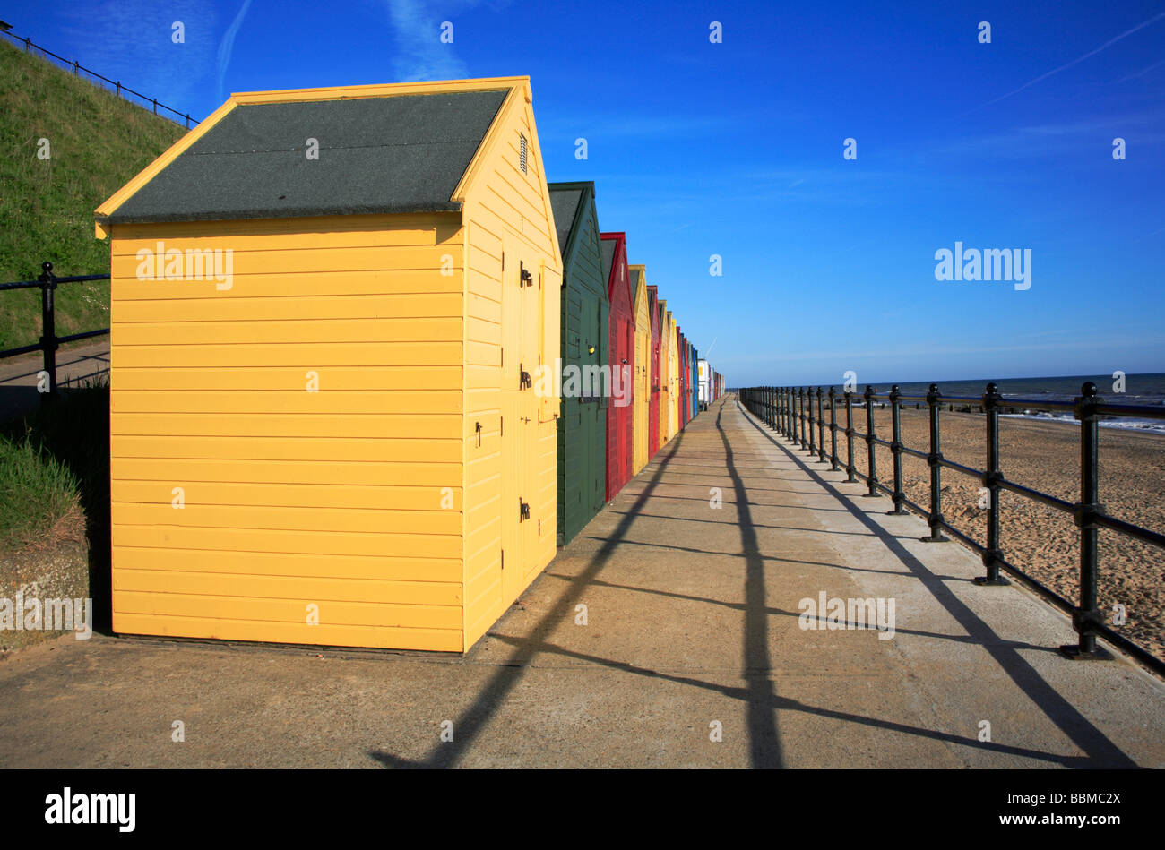 Beach huts on the promenade at Mundesley, Norfolk, UK Stock Photo - Alamy