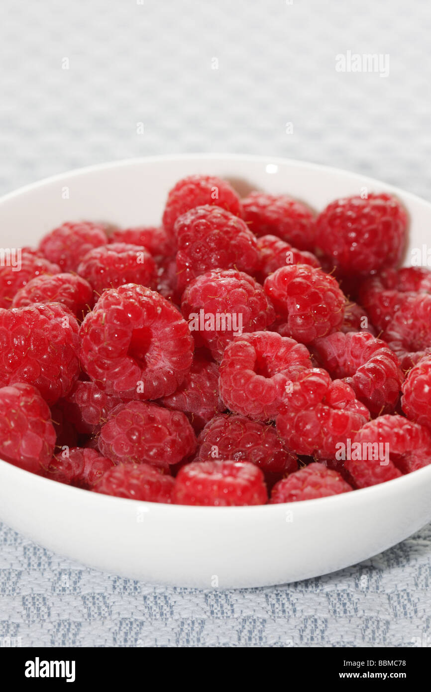 Bowl of Raspberries Stock Photo - Alamy