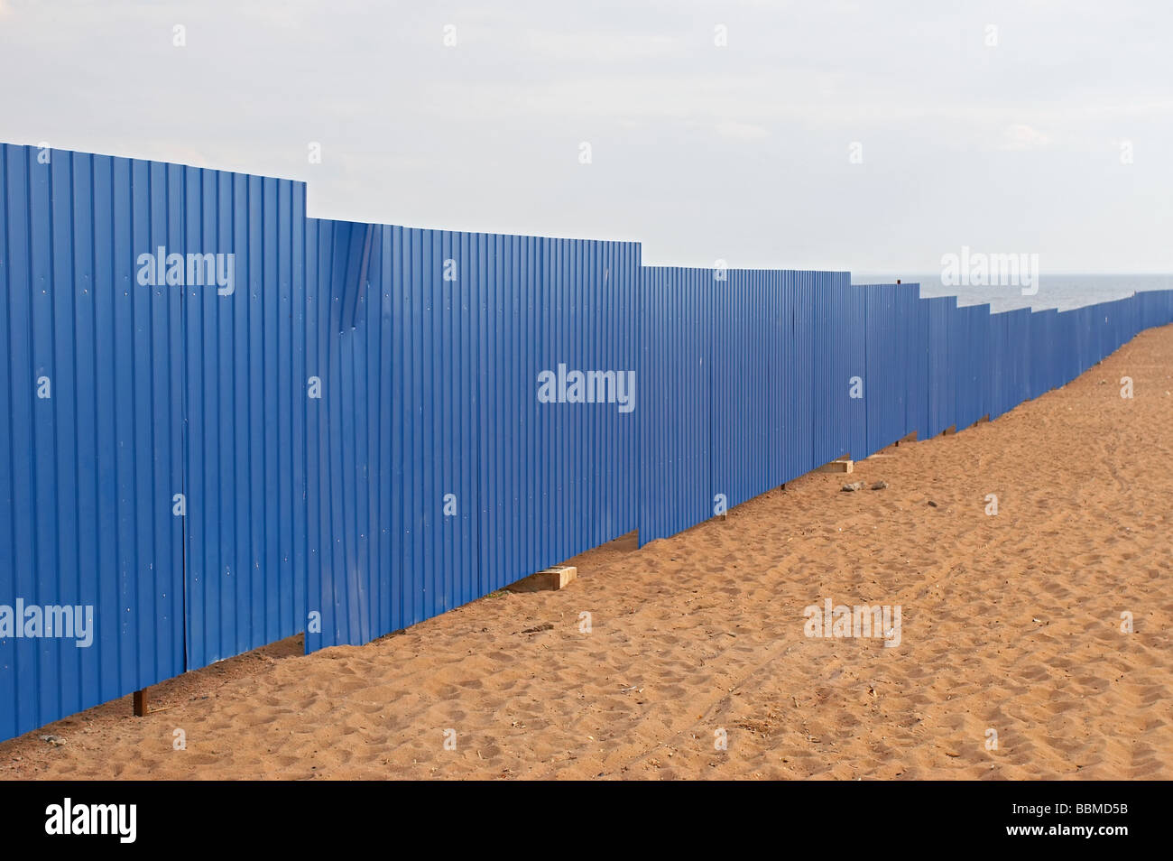 long fence of private beach Stock Photo - Alamy