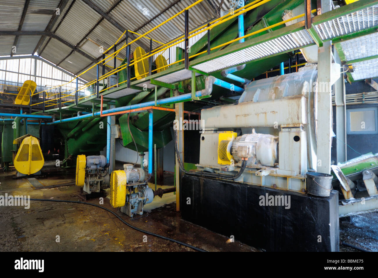 Salt from sea water being processed for purity Stock Photo - Alamy
