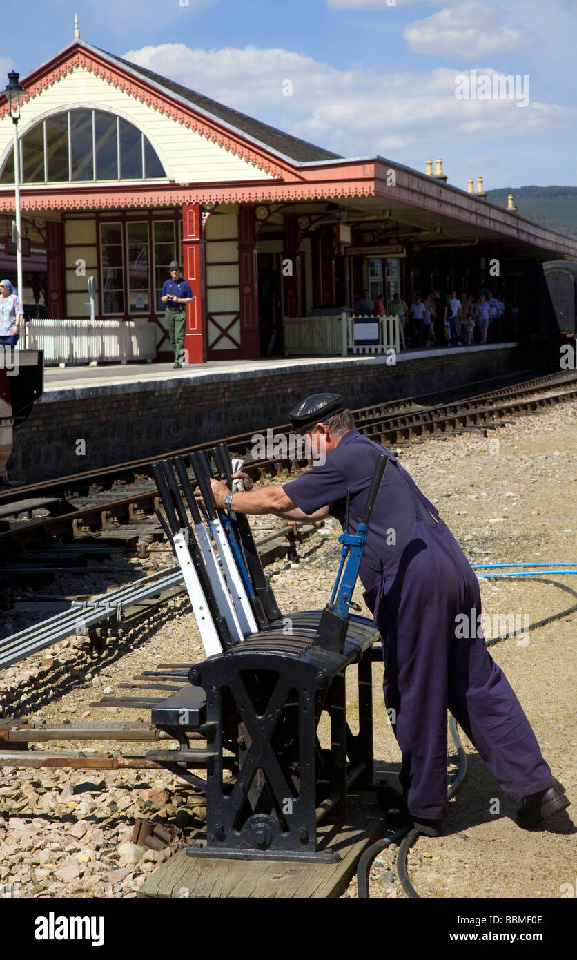 Railway man changing points at Strathspey Restored Steam Railway, Boat ...