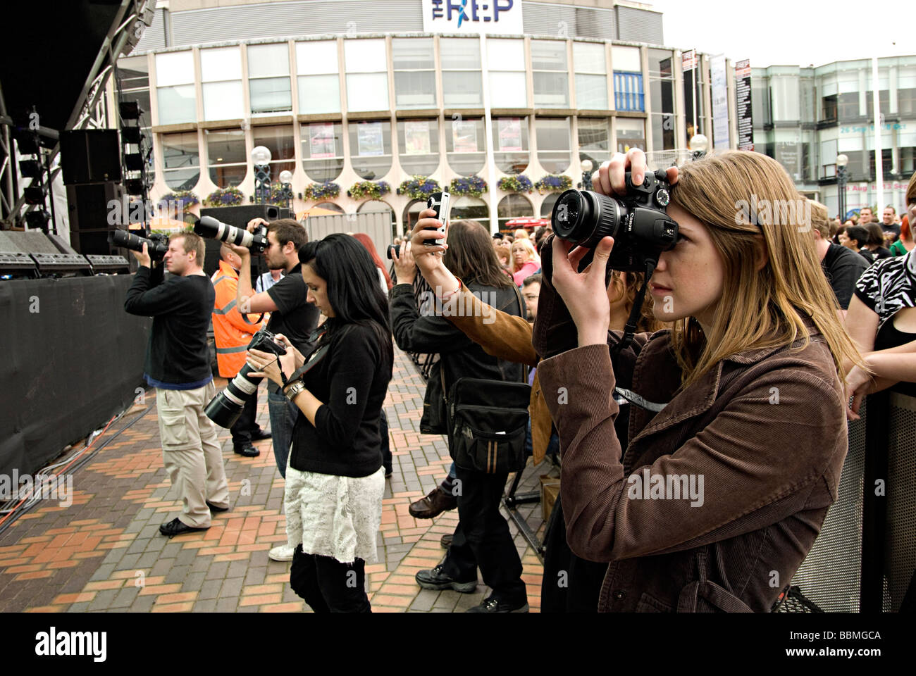 photographers at artsfest 2008 in the photo pit photographing bands on ...