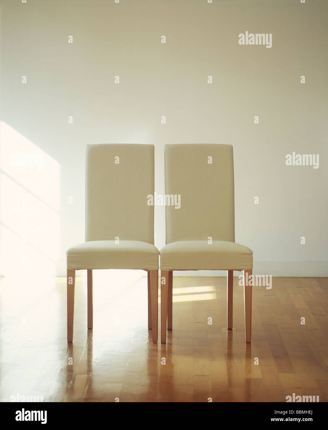 Two chairs in room Stock Photo - Alamy