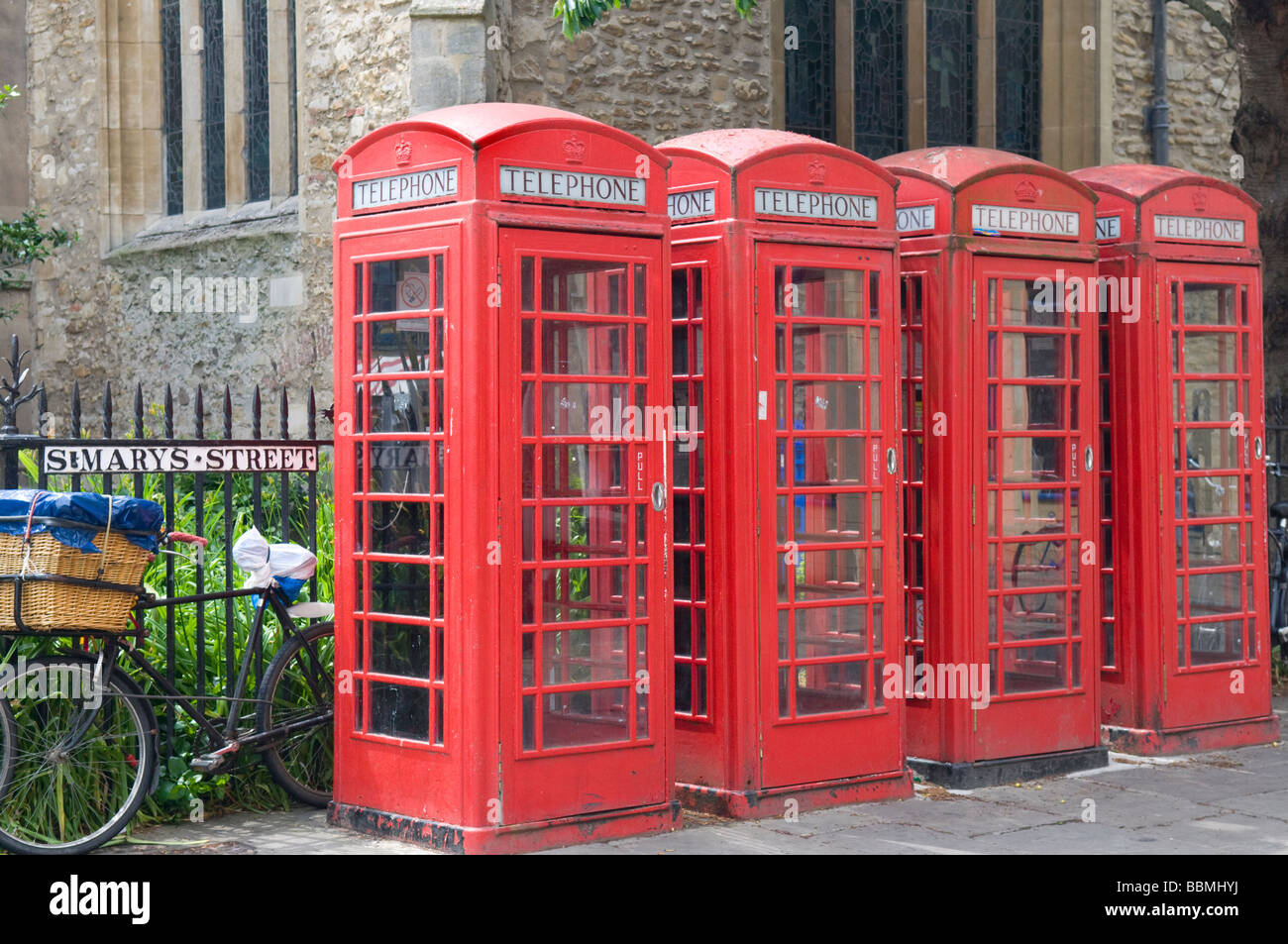 Four British red telephone boxes, Cambridge Stock Photo - Alamy