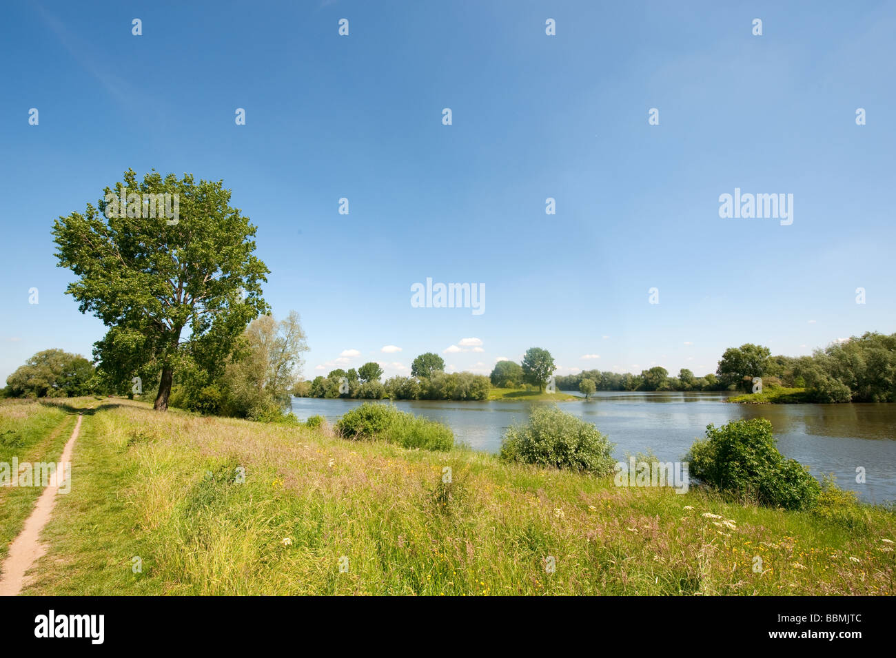 Landscape with the Meuse river Stock Photo - Alamy