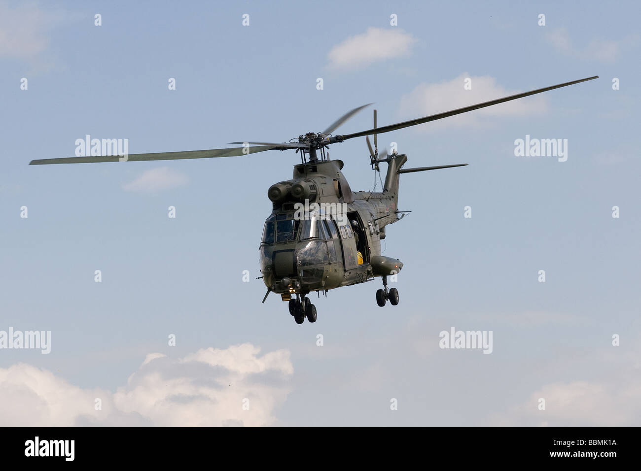 A RAF puma helicopter over Huddersfield at Crosland Moor Stock Photo ...