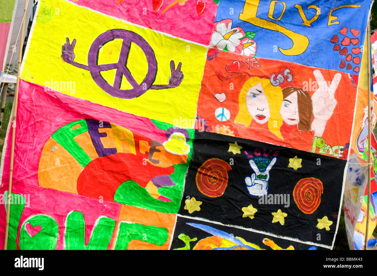 Peace and love banners at Cambridge Strawberry Fair Stock Photo - Alamy