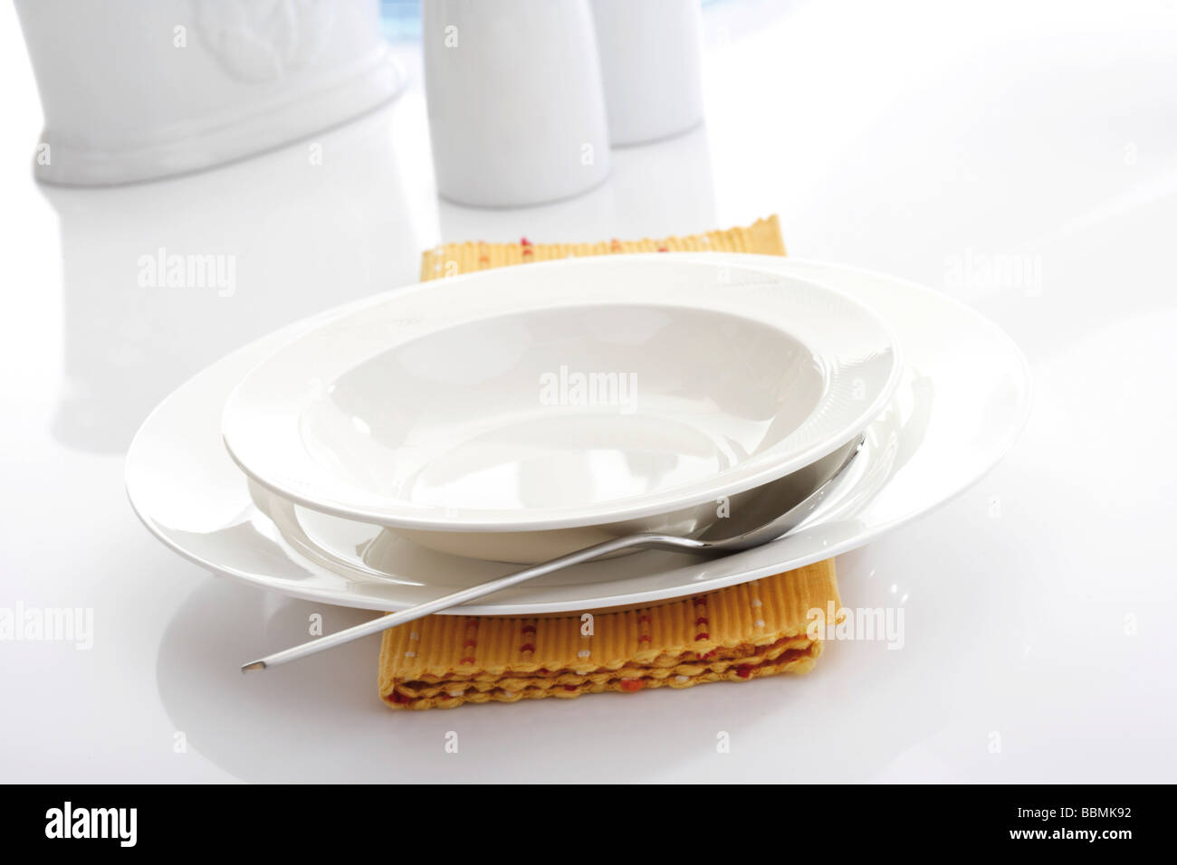 Soup plates, empty Stock Photo - Alamy