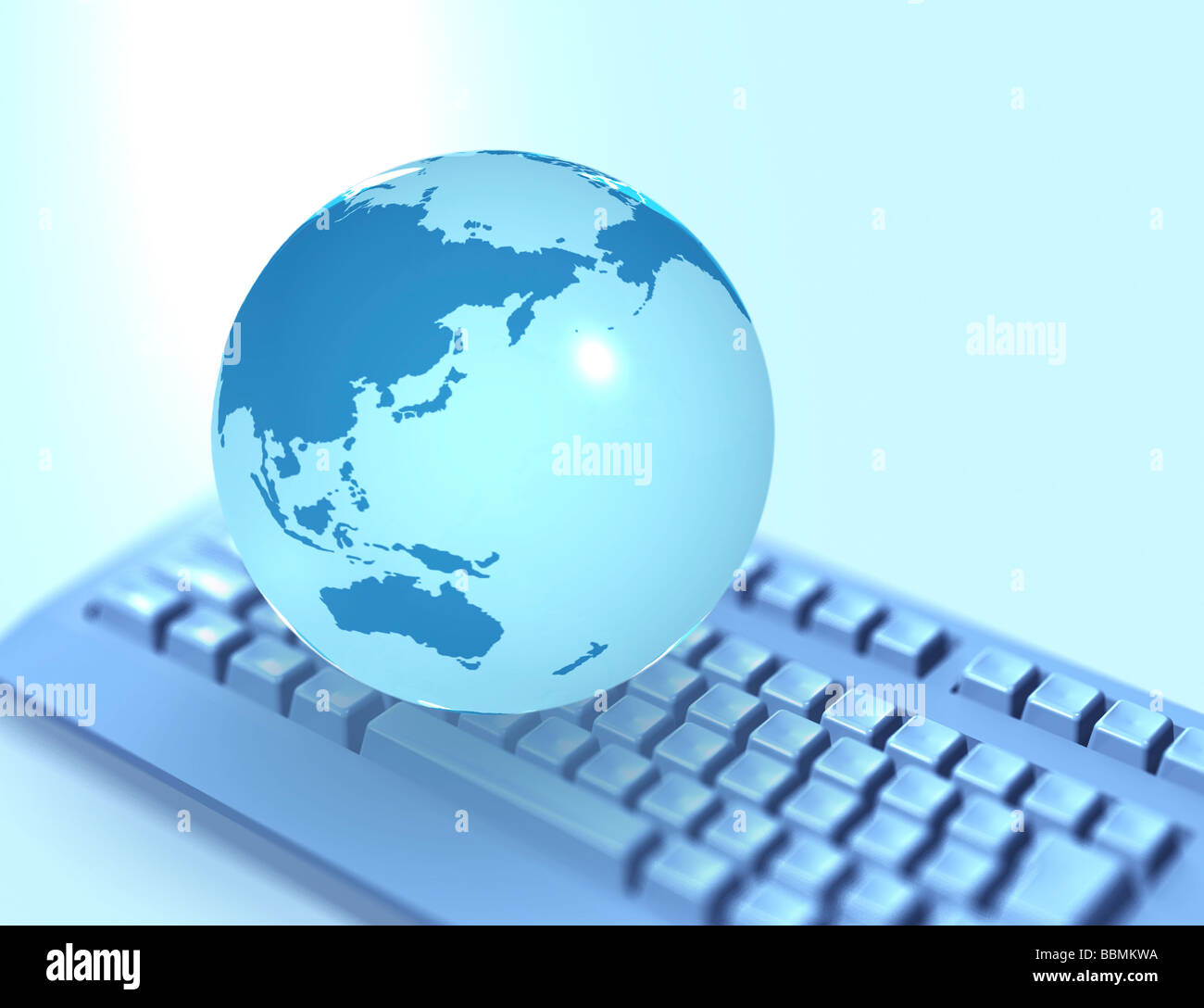 Digital composite of globe on keyboard Stock Photo - Alamy