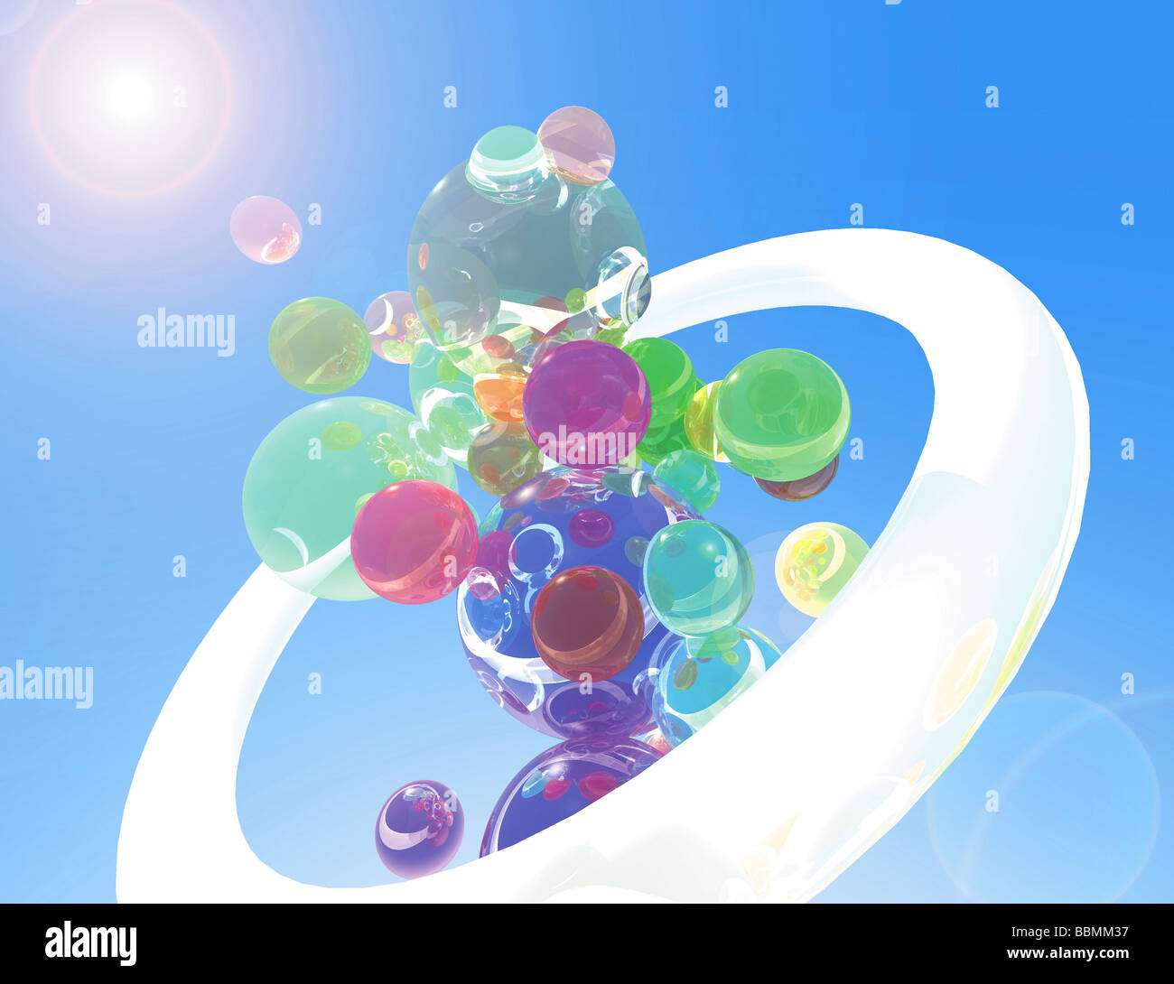 Marbles and ring in sky Stock Photo - Alamy