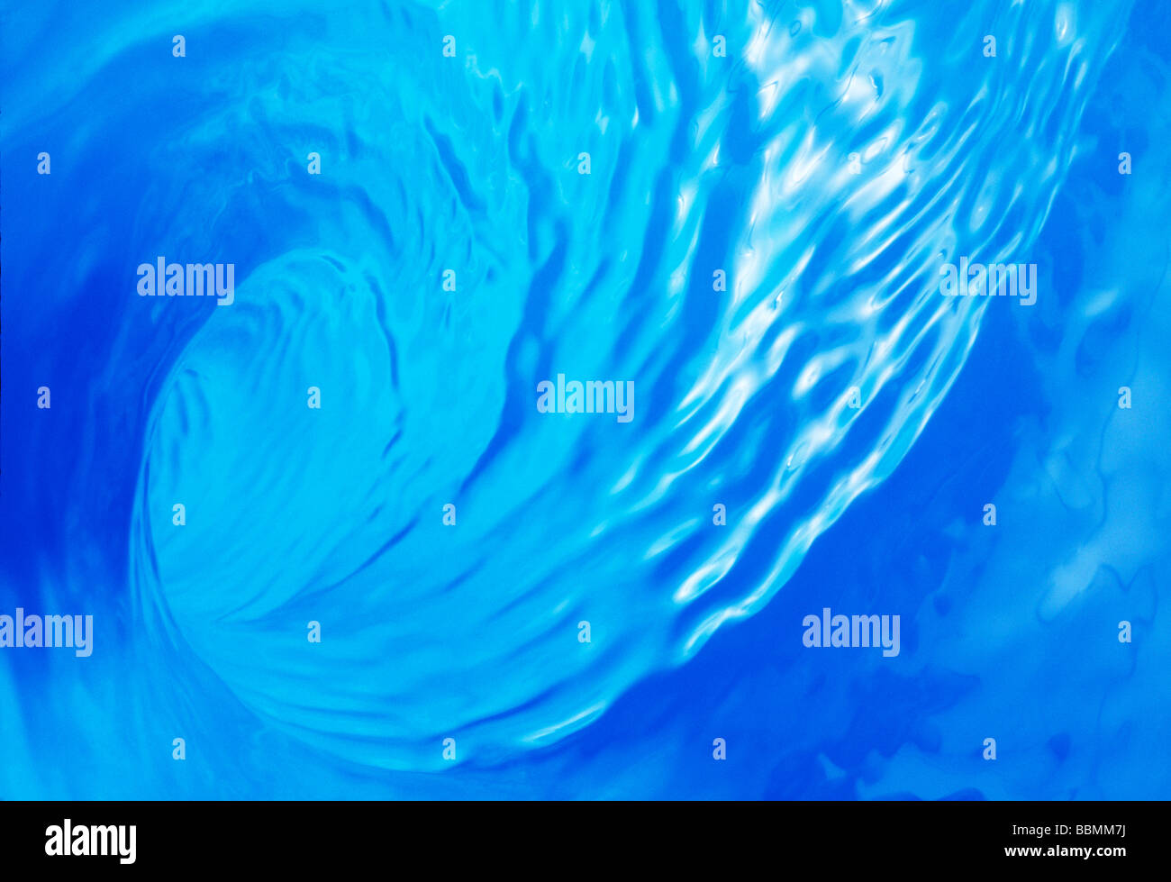 Tilted view of whirling water Stock Photo - Alamy