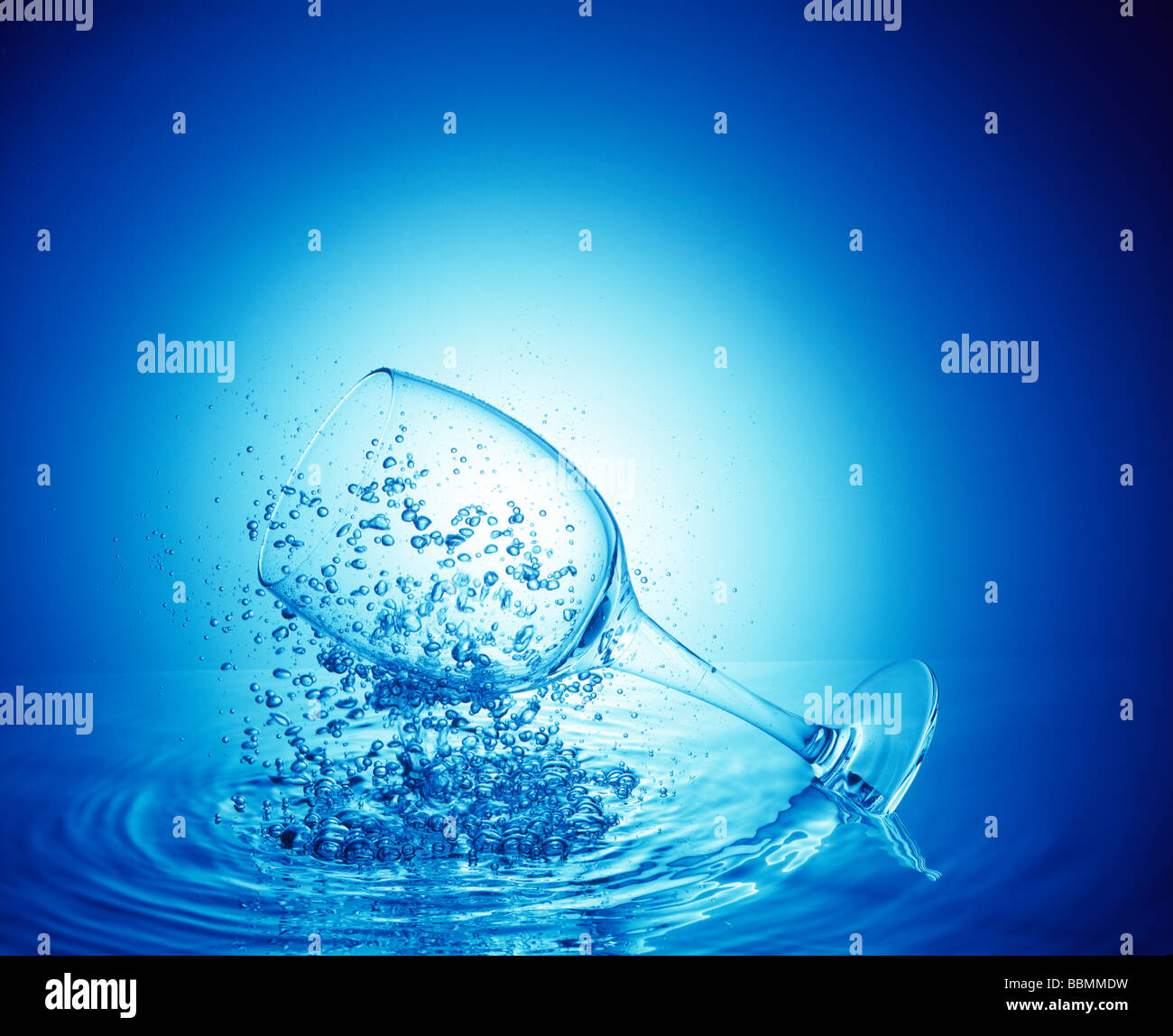 Glass falling into water (digital composite Stock Photo - Alamy