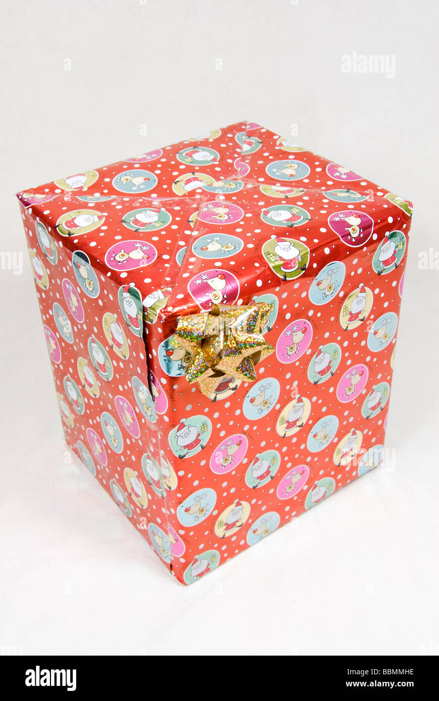 Christmas present gold red cut out hi-res stock photography and images ...