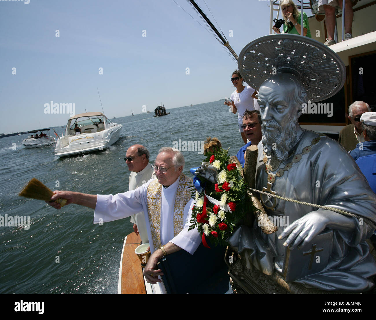 A Priest blesses boats during the annual St. Andrew the Apostle Society ...