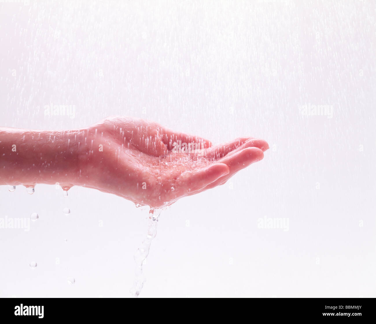 Hand wetting hi-res stock photography and images - Alamy