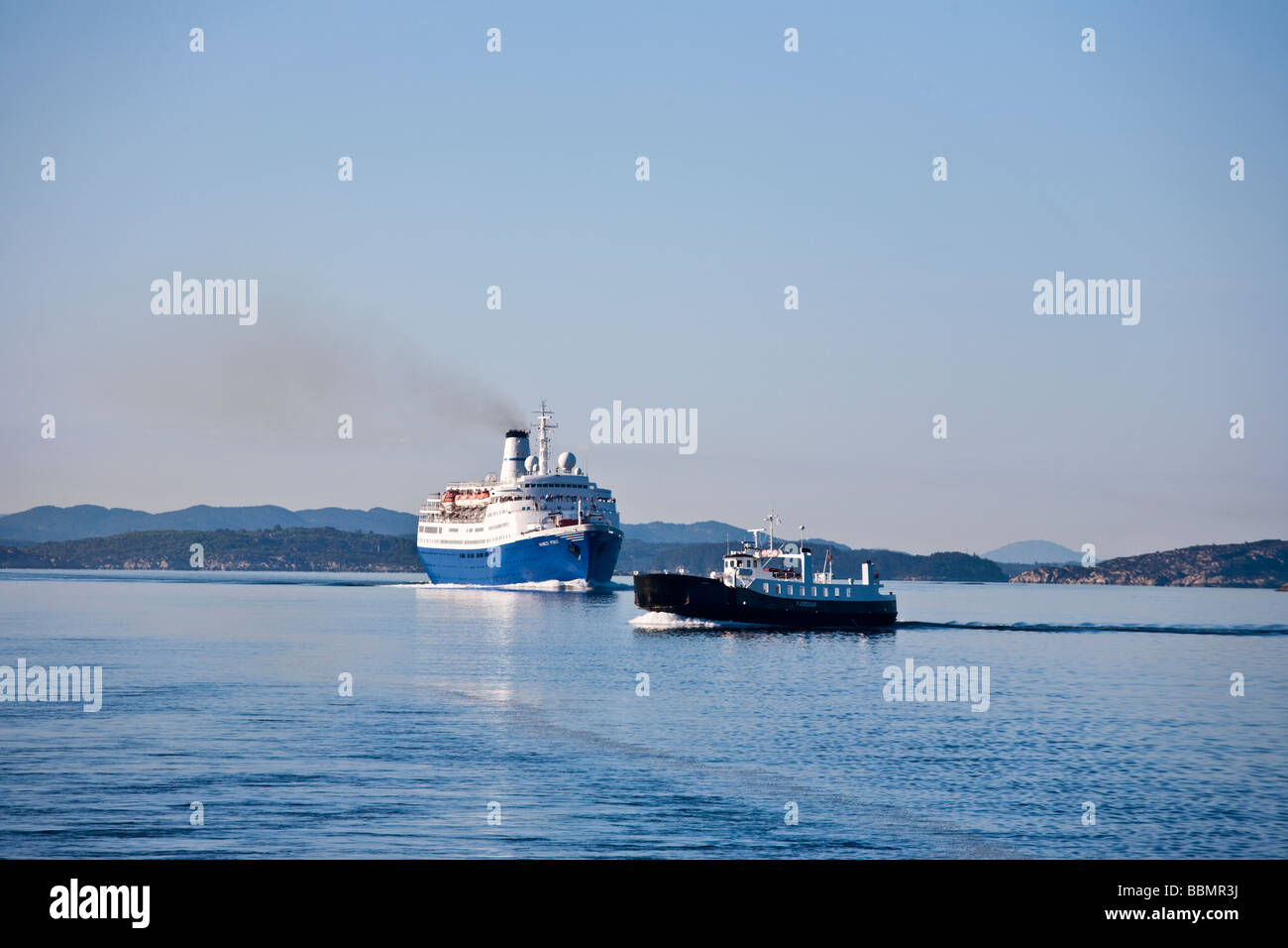 cruise ship in a norwegian fjord Stock Photo - Alamy