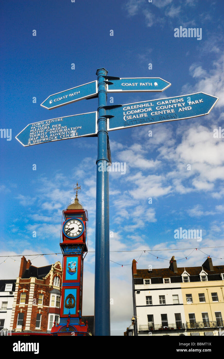 Jubilee clock and street signpost in weymouth Dorset England UK Stock ...