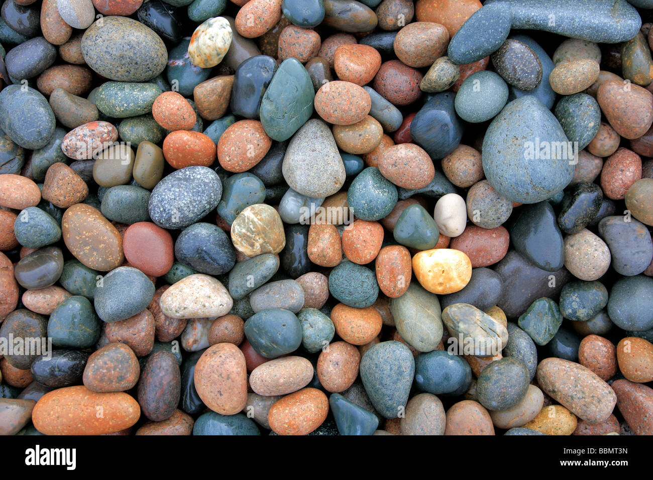 Colourfull Pebble Patterns on a beach Stock Photo - Alamy