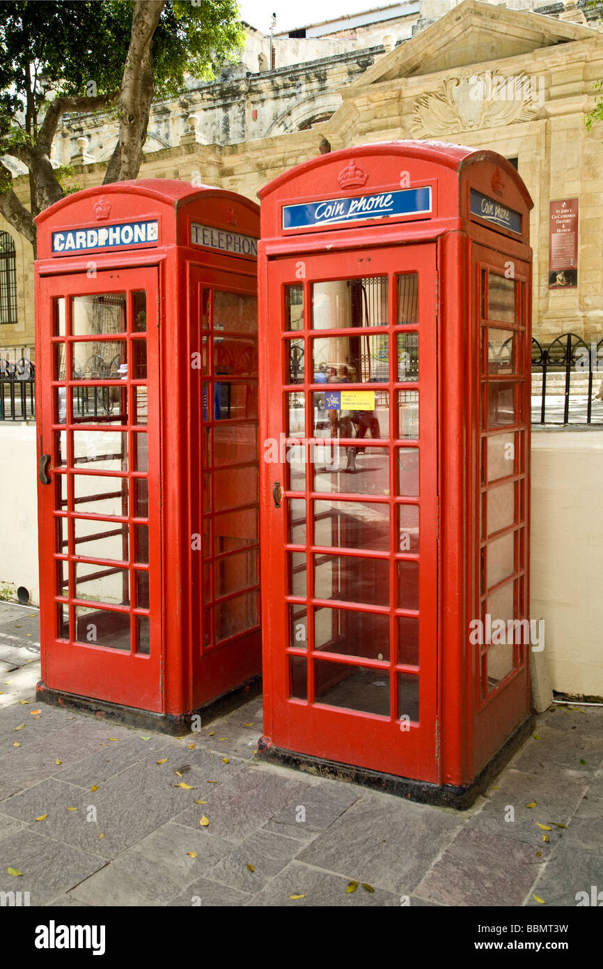 Two red telephone boxes outside the Cathedral of St John in Valletta ...