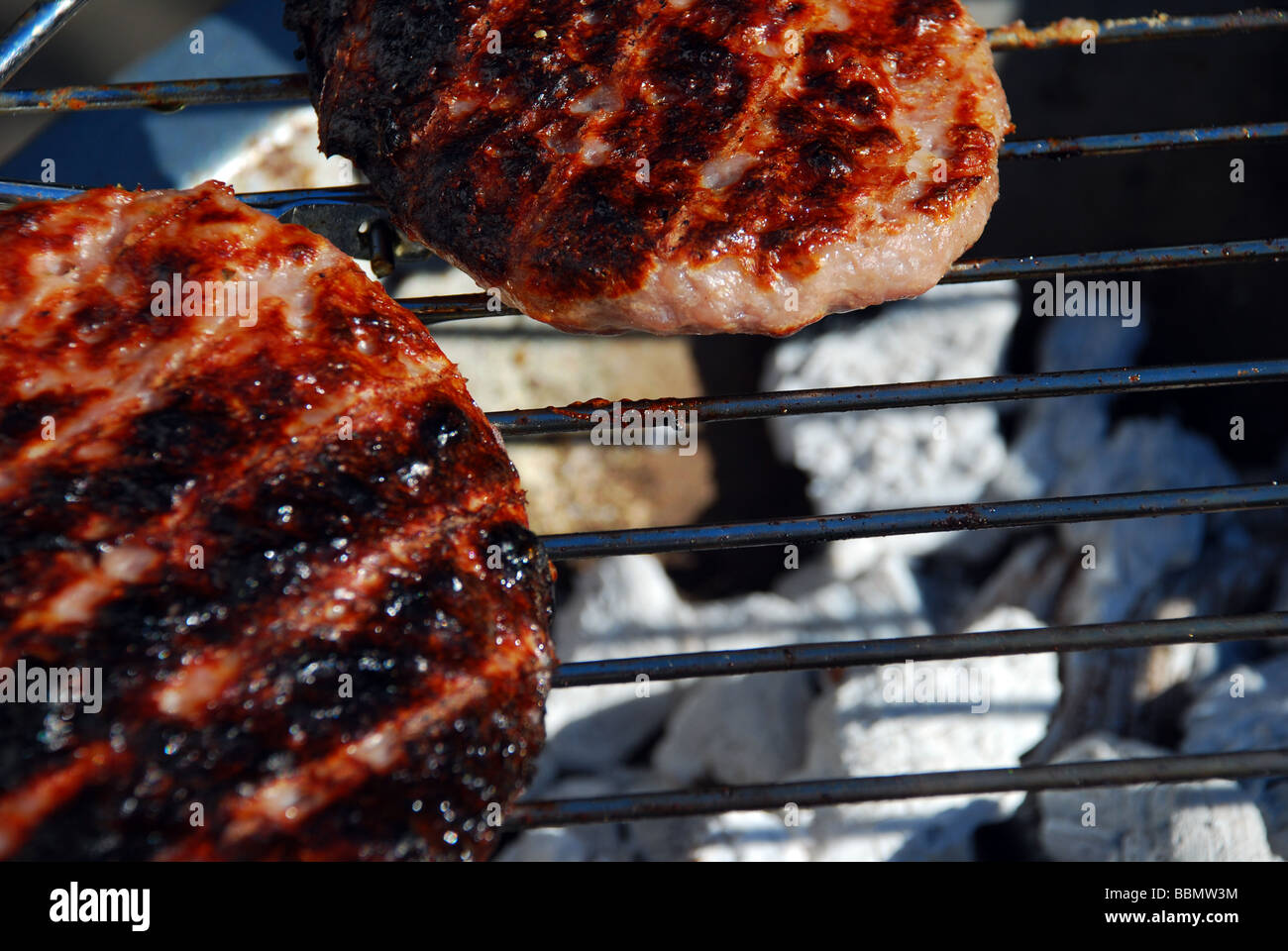 Burgers on BBQ Stock Photo - Alamy