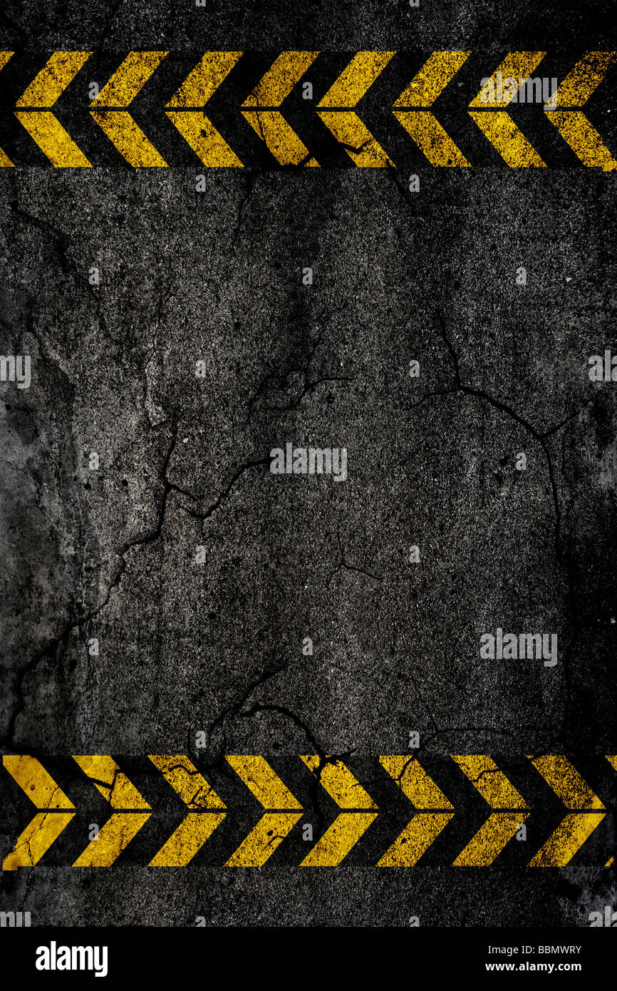 Asphalt background texture with construction signs Stock Photo - Alamy