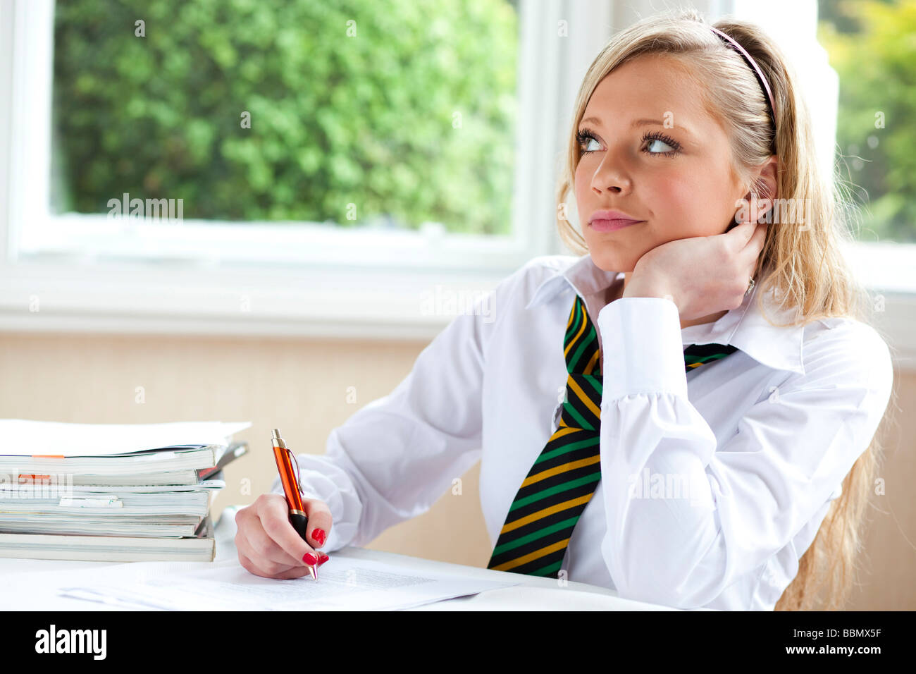 School girl revising Stock Photo - Alamy