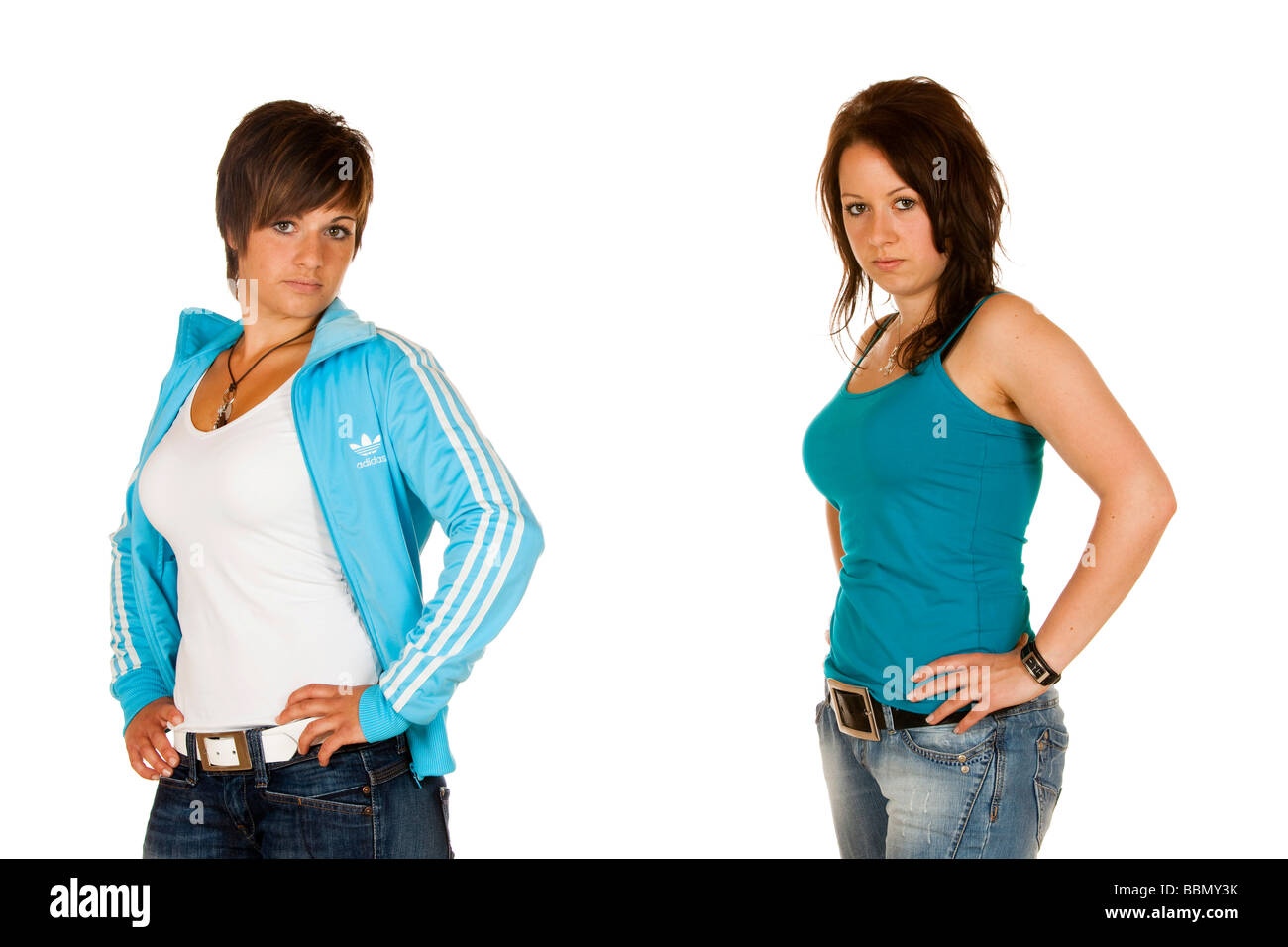 Two young women looking serious Stock Photo - Alamy