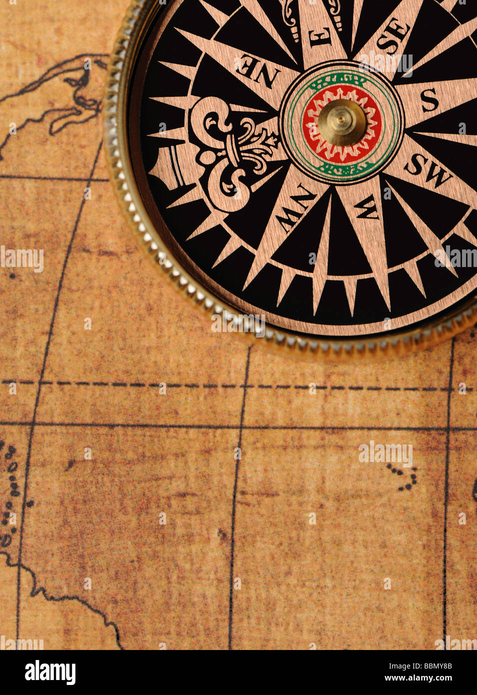 Old compass and map background Old gold color Stock Photo - Alamy