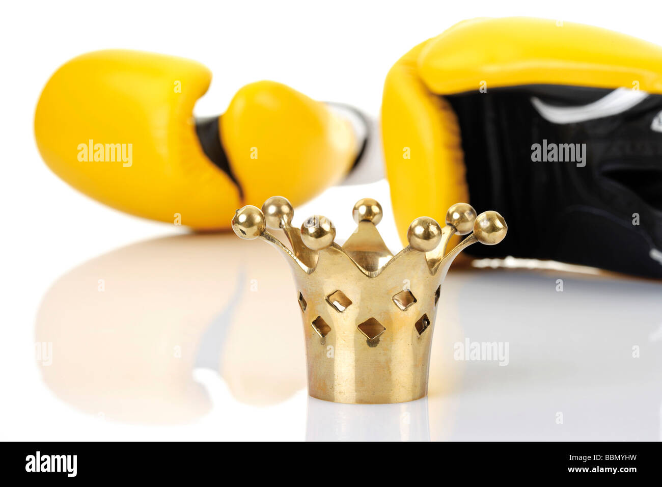 Yellow boxing gloves with a golden crown Stock Photo - Alamy
