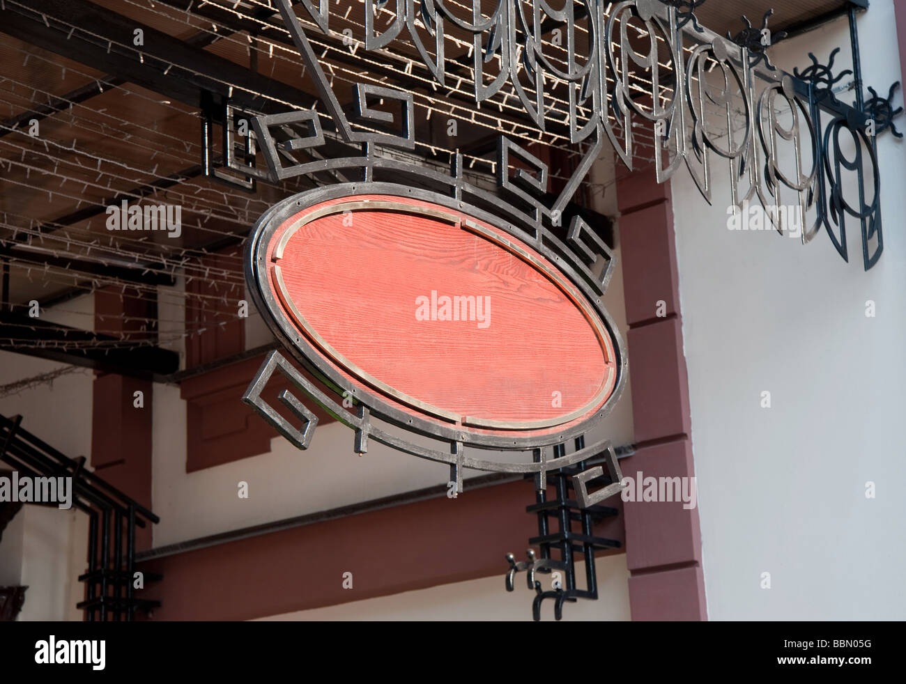 Signboard on hotel An iron frame the wooden basis Stock Photo - Alamy