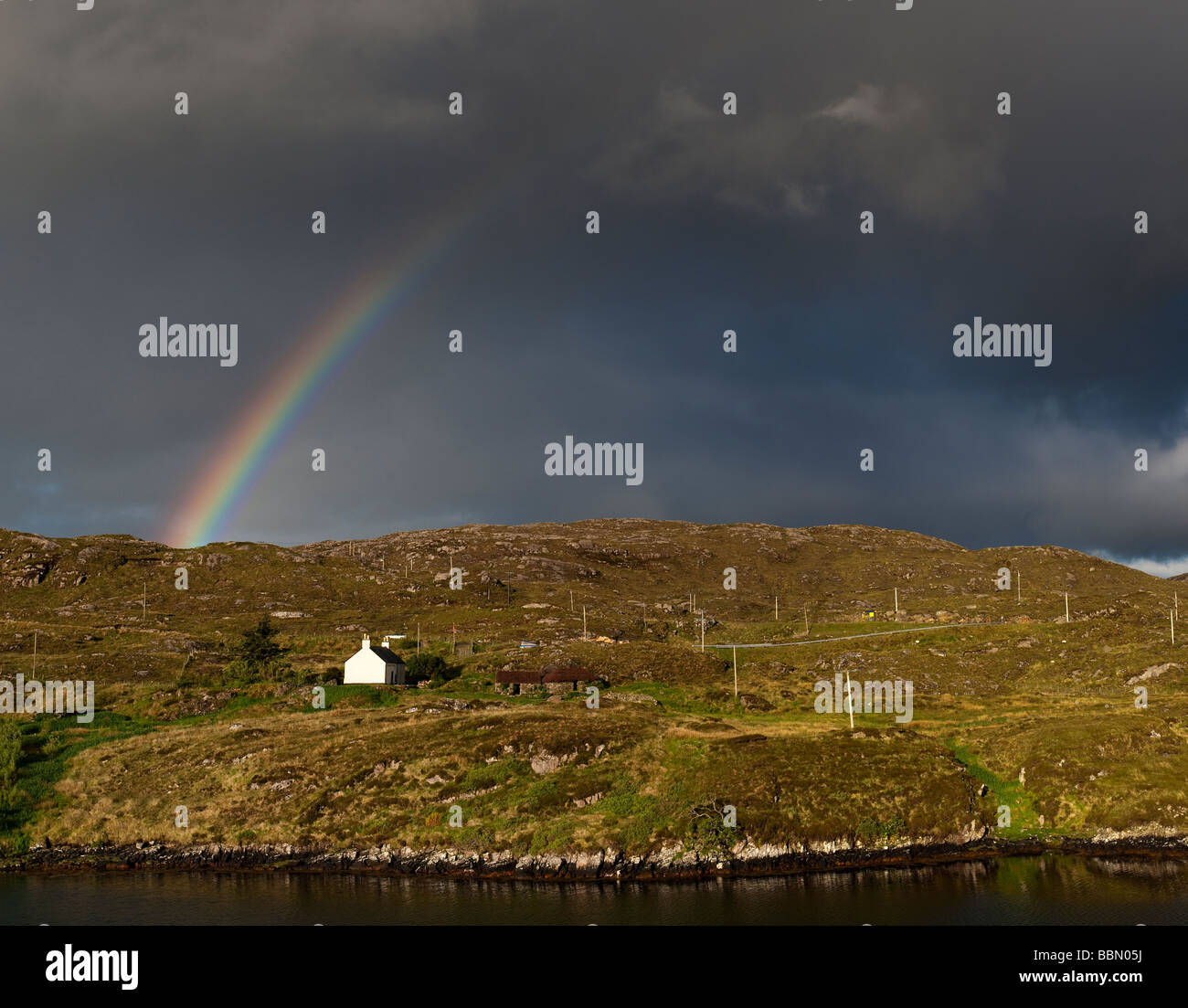 Rainbow over a croft house and loch, Isle of Harris, Outer Hebrides ...