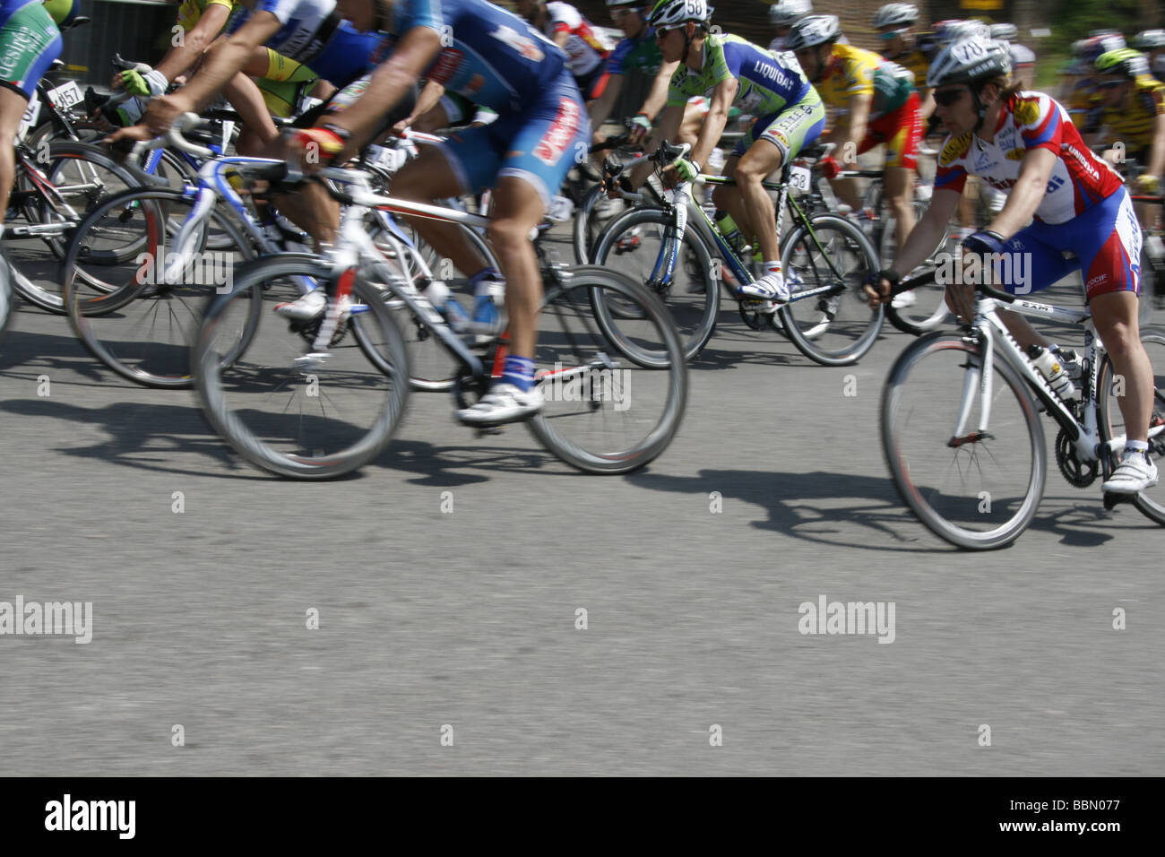 professional bike riders in road street race in city town Stock Photo ...