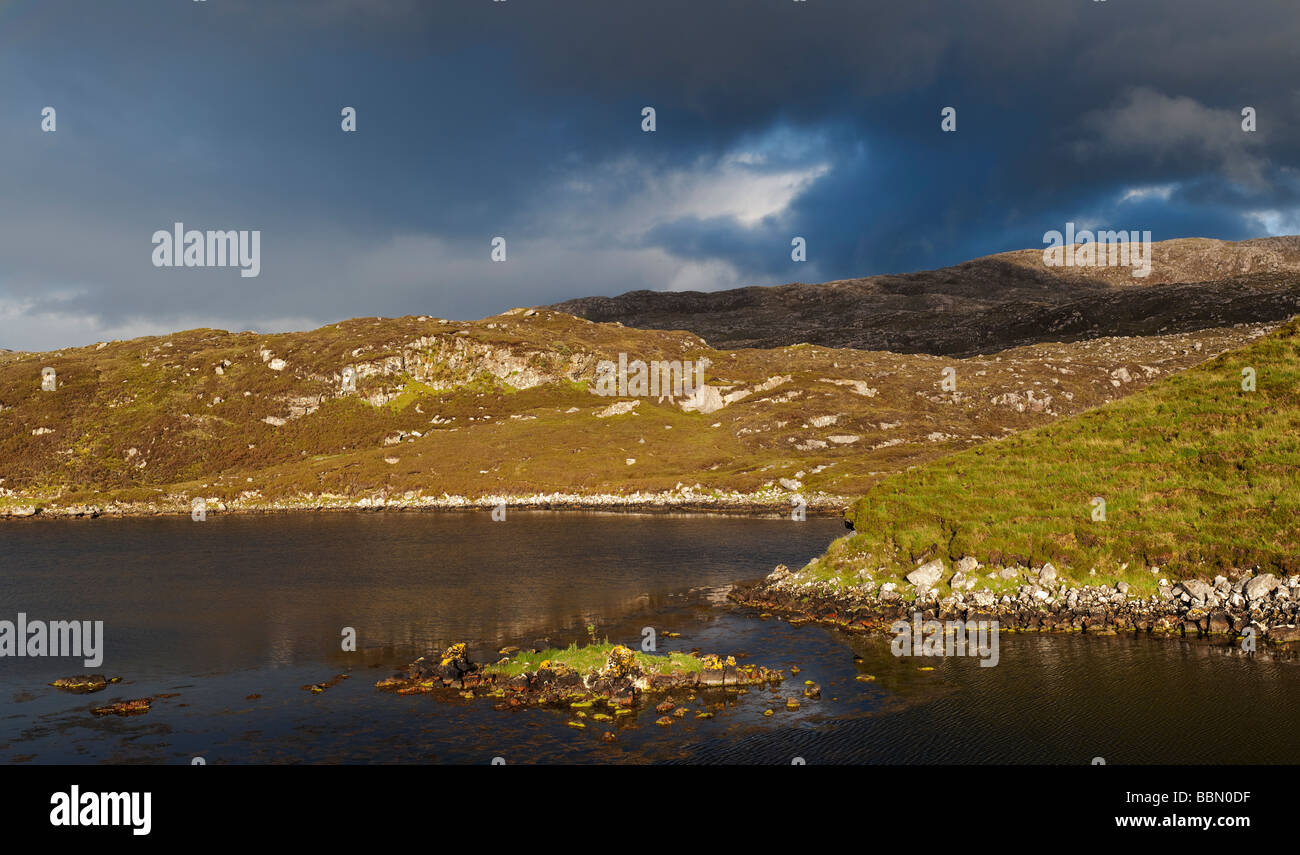 Storm light over an inland loch, east coast, Isle of harris, Outer ...