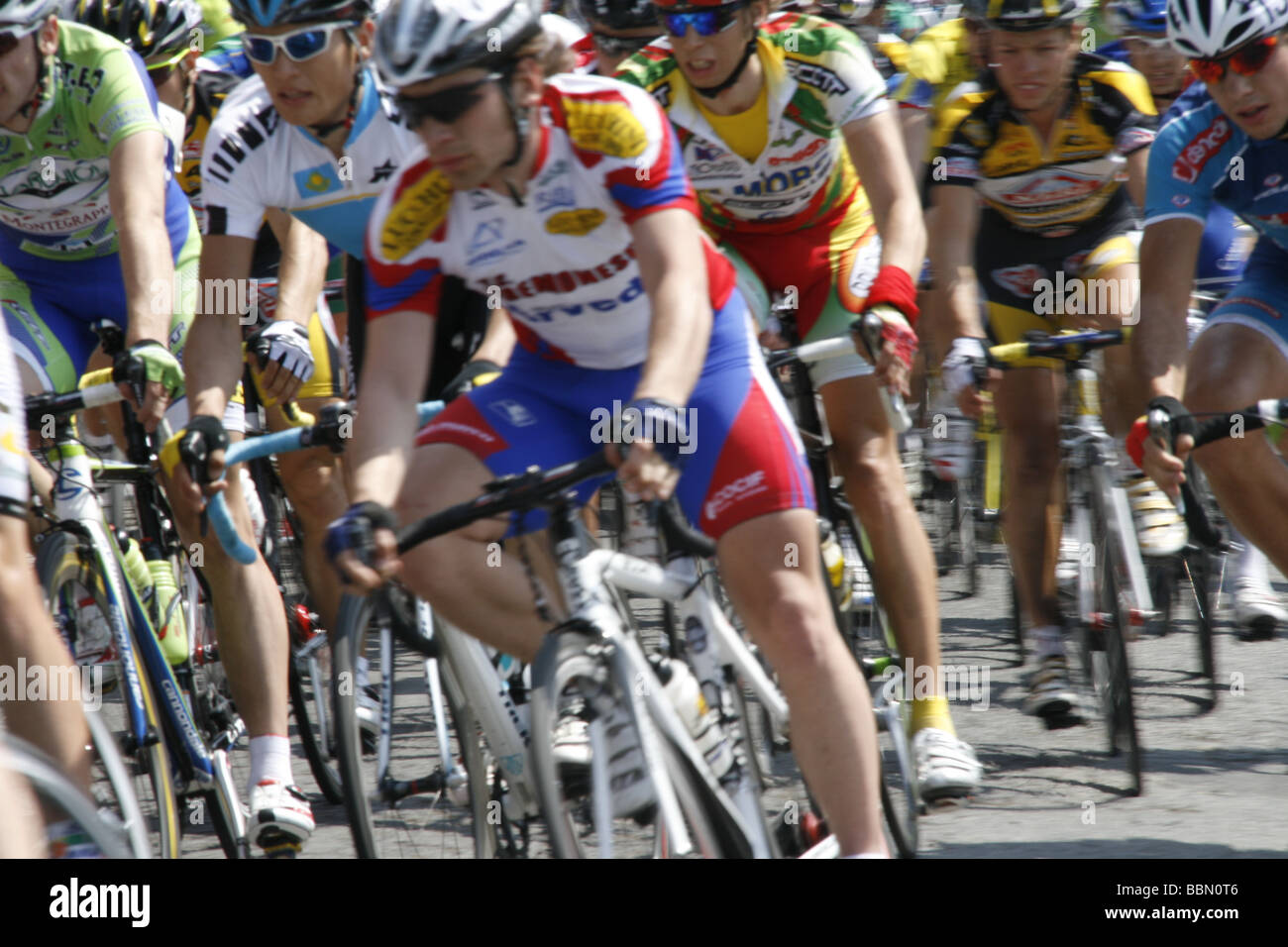 professional bike riders in road street race in city town Stock Photo ...