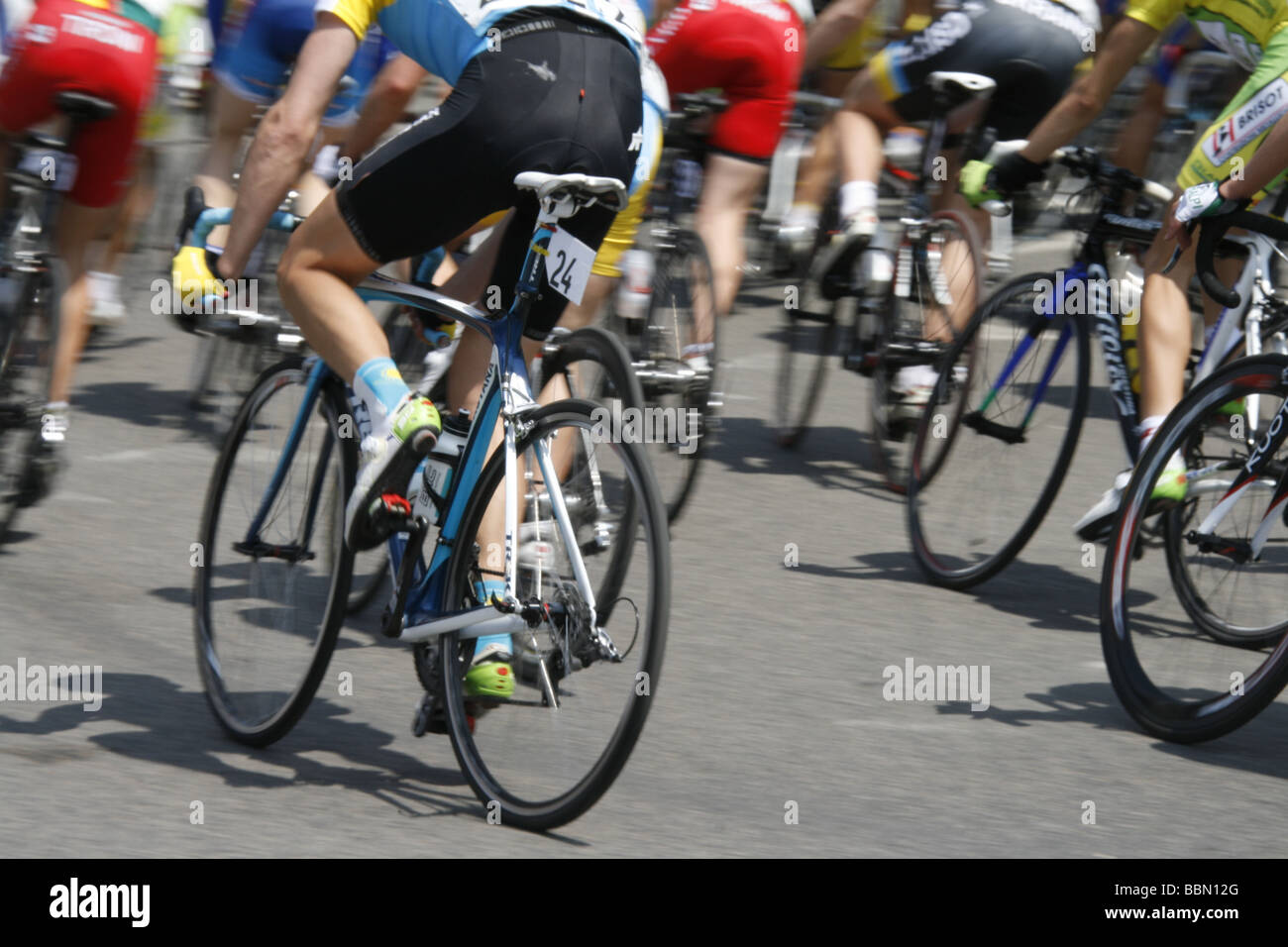 professional bike riders in road street race in city town Stock Photo ...