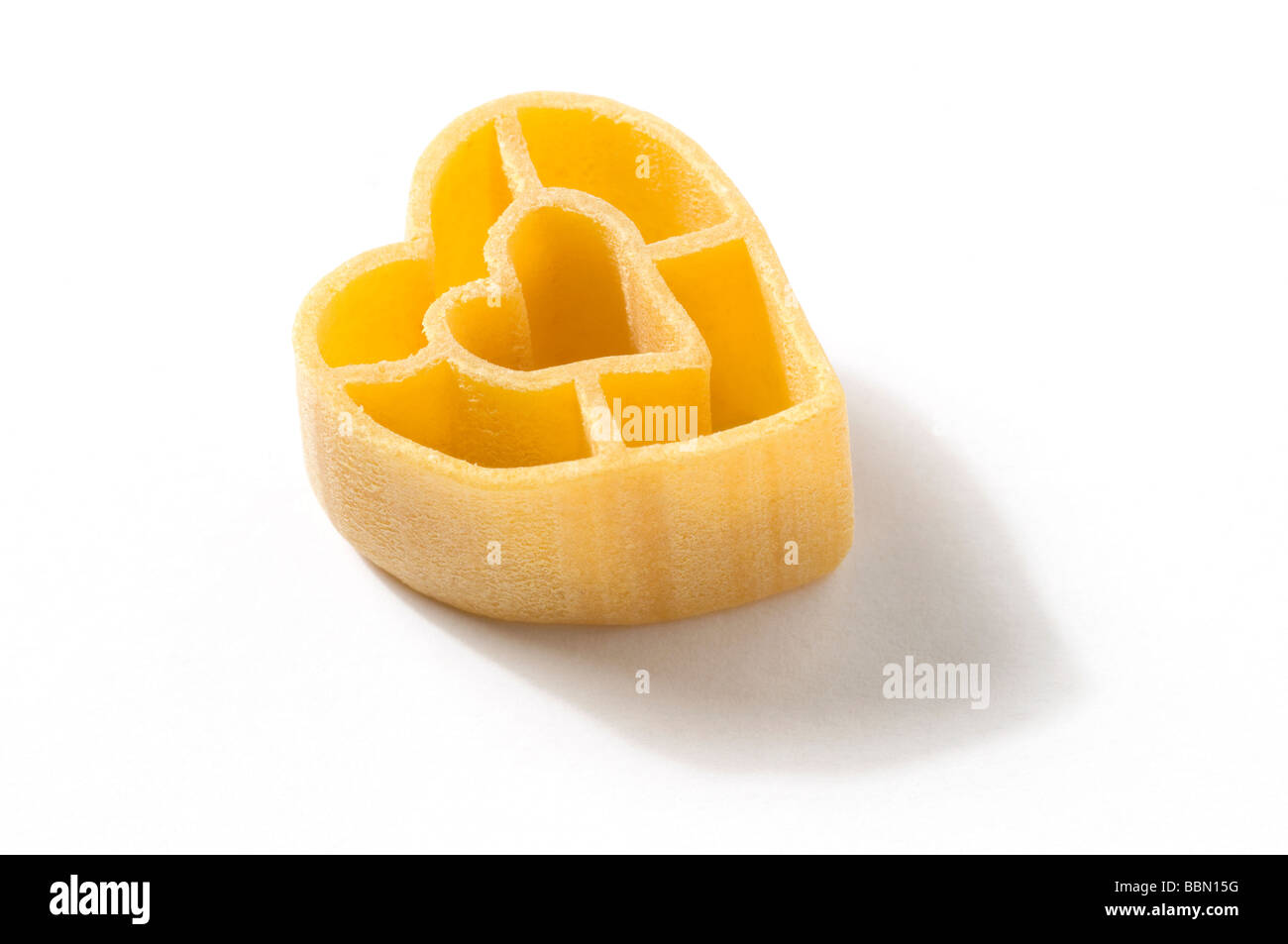 heart shaped pasta on white background Stock Photo - Alamy